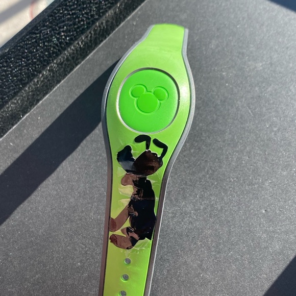 Disney | Other | Disney Green Magic Band With Added Pluto Decal Some ...